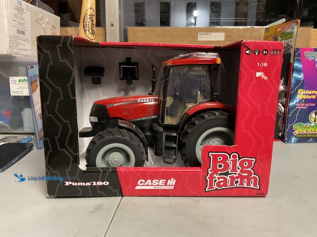 LiquidBidding - Lot 49-1810068 - COLLECTIBLE BIG FARM PUMA 180 1/16 ...