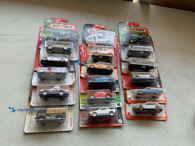 LiquidBidding - Lot 49-1804231 - 15 NEW IN PACKAGES 1/64 SCALE MATCHBOX ...